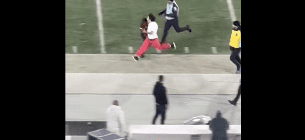 Security Guard at USC Trojans game has the hit of the year on fan